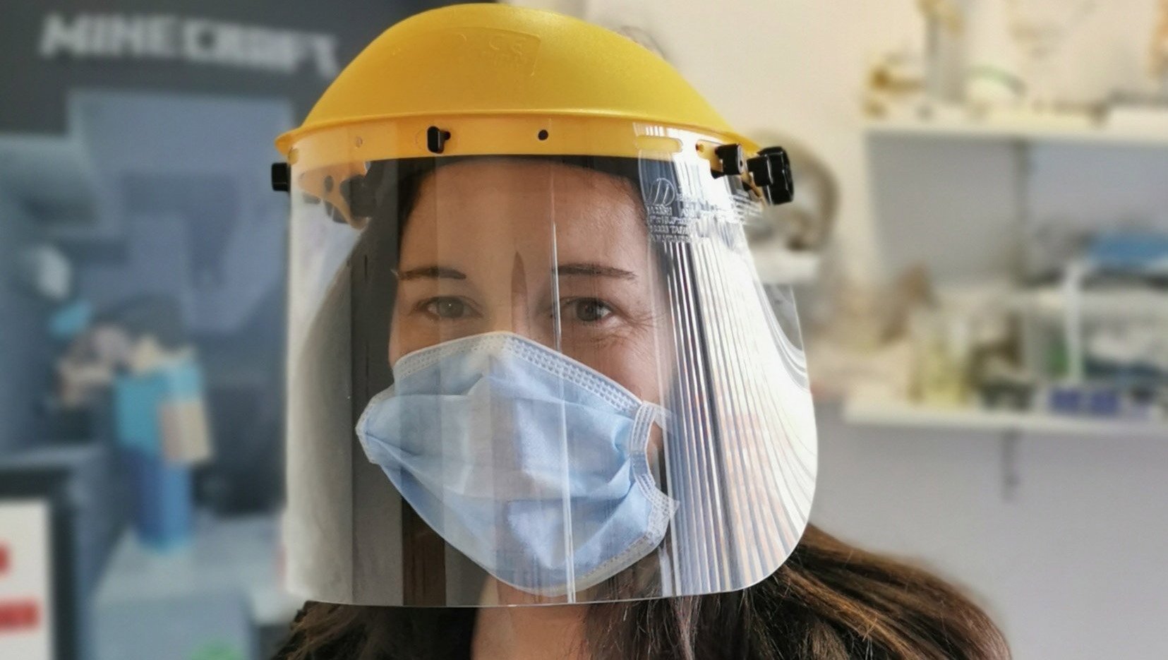 Pictured is Dr Illona Duffy with her own ‘improvised’ face-mask ...